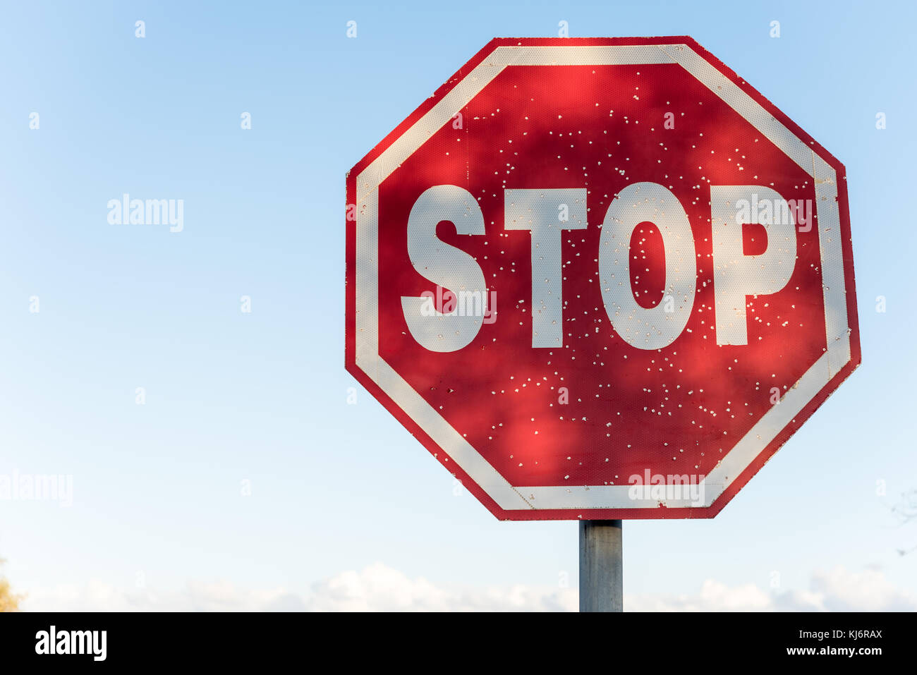 Bullet holes on traffic sign hi-res stock photography and images - Alamy
