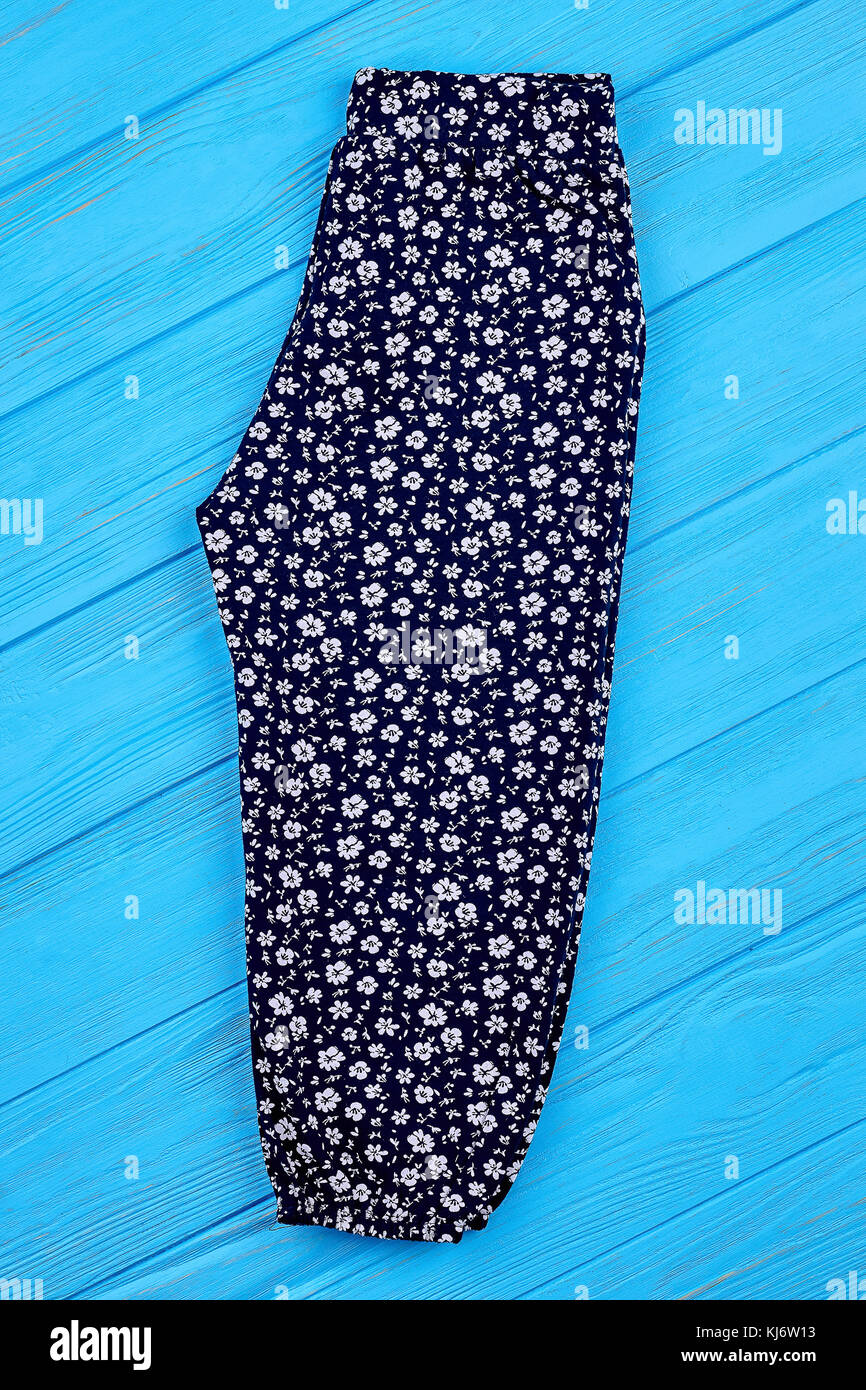 Casual dark blue baby girl pants. Vertical image of trendy summer ...