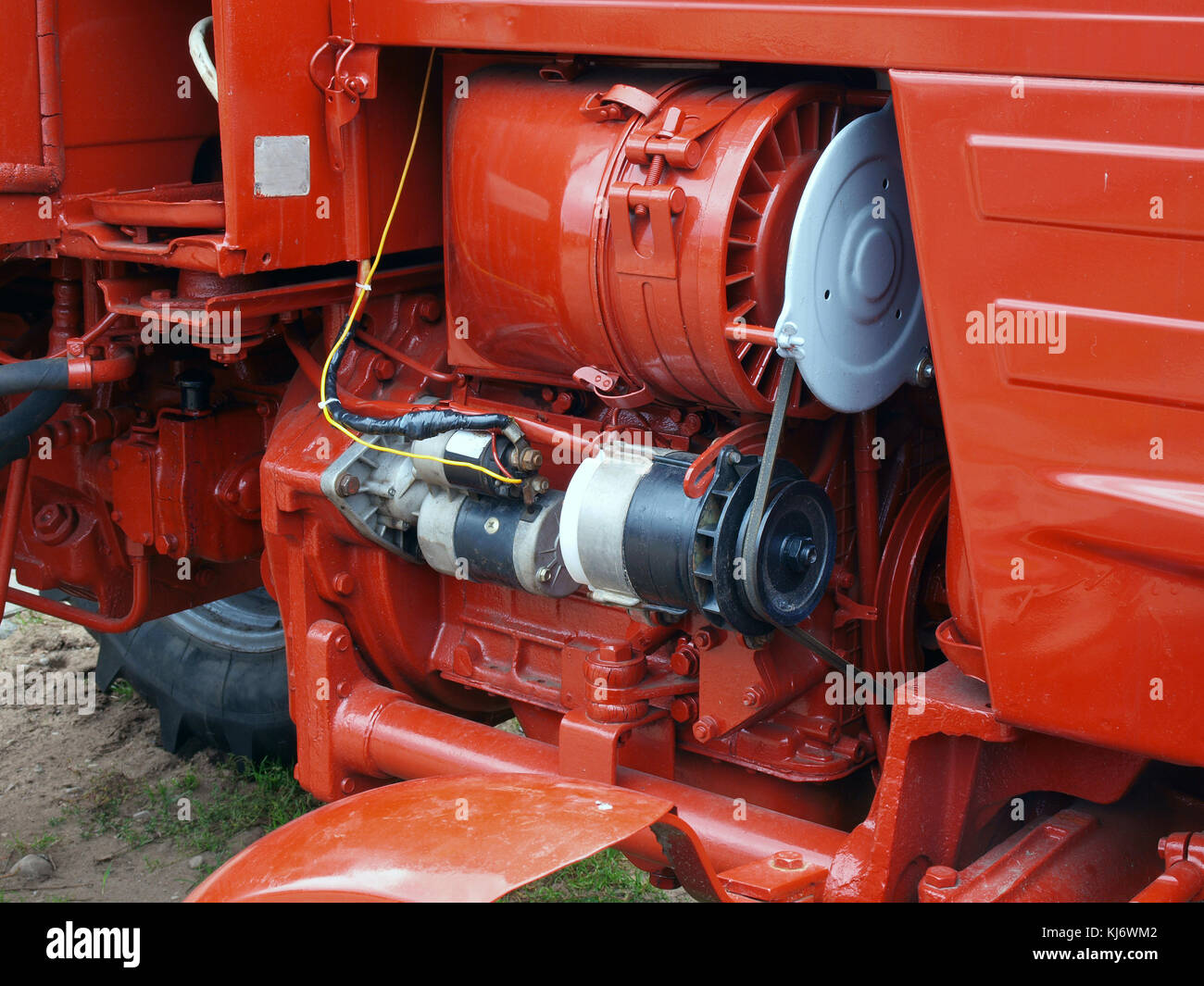 Red color tractor diesel engine air cooling close up Stock Photo - Alamy