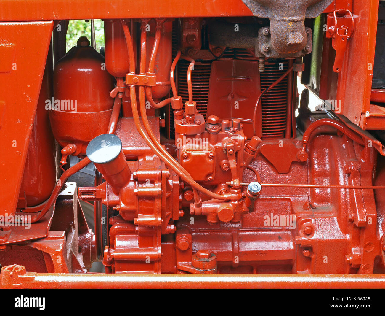 Red color tractor diesel engine air cooling close up Stock Photo - Alamy