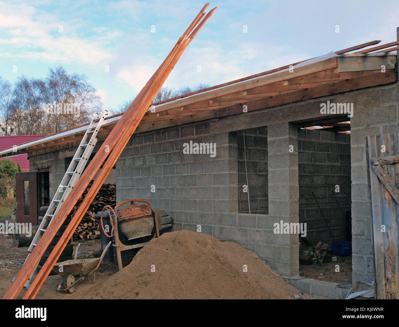 Small farm household building under construction on autumn Stock Photo ...