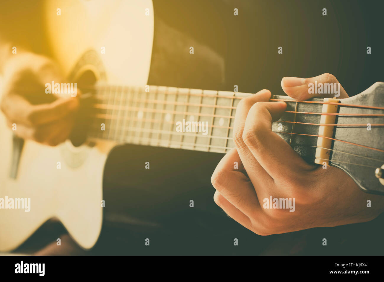 Close up human hand show playing guitar Stock Photo - Alamy