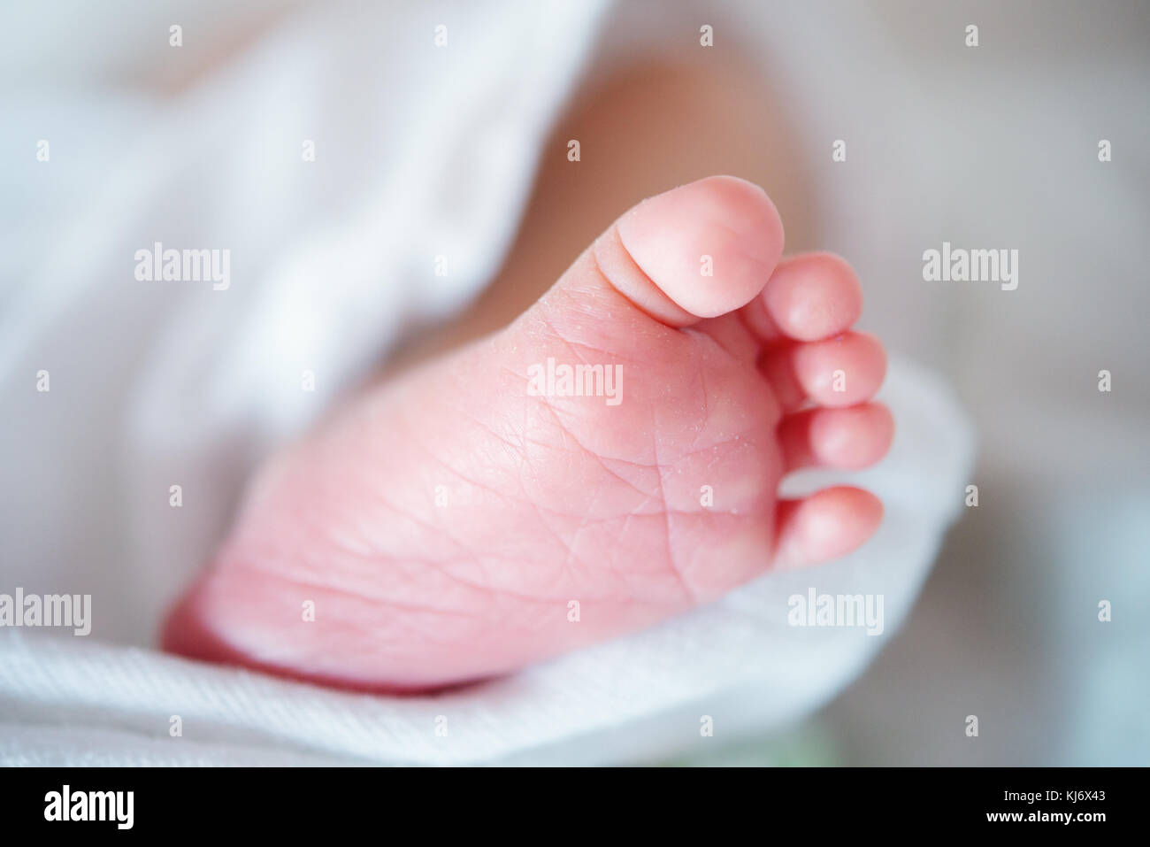 Newborn baby foot, close up Stock Photo - Alamy