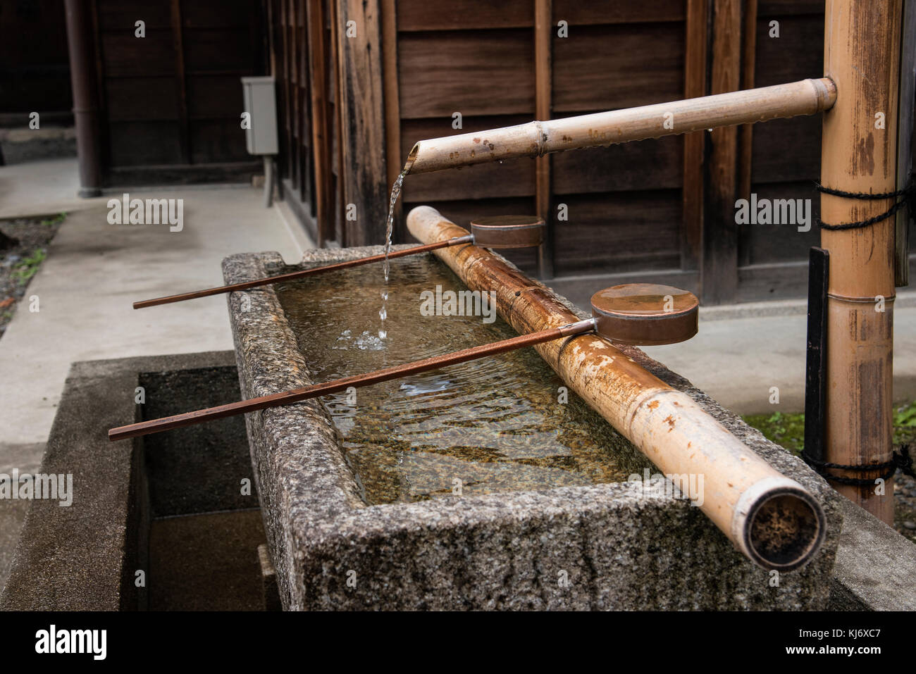 Traditional Japanese water basin of japanese temple Stock Photo - Alamy