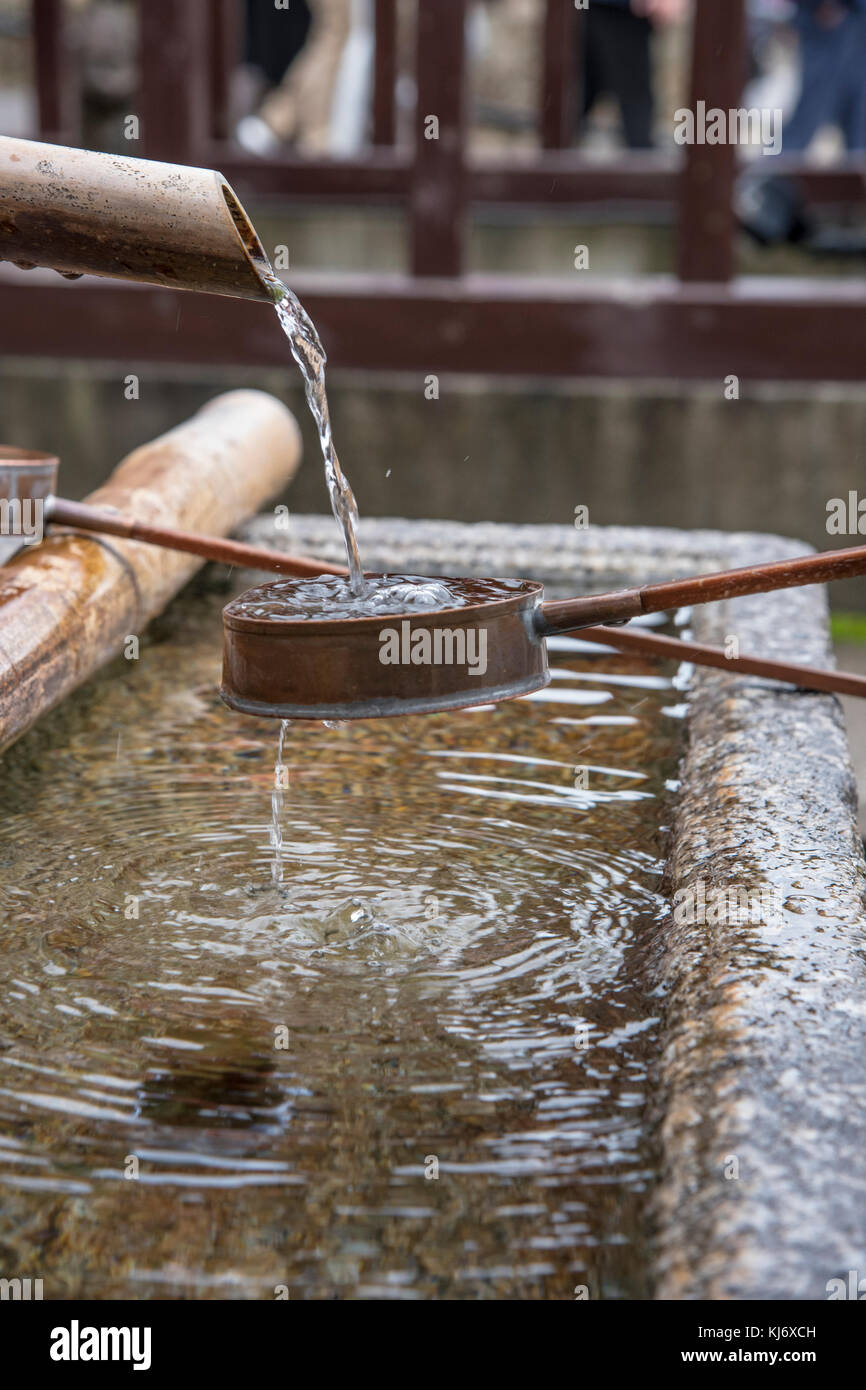 Traditional Japanese water basin of japanese temple Stock Photo - Alamy