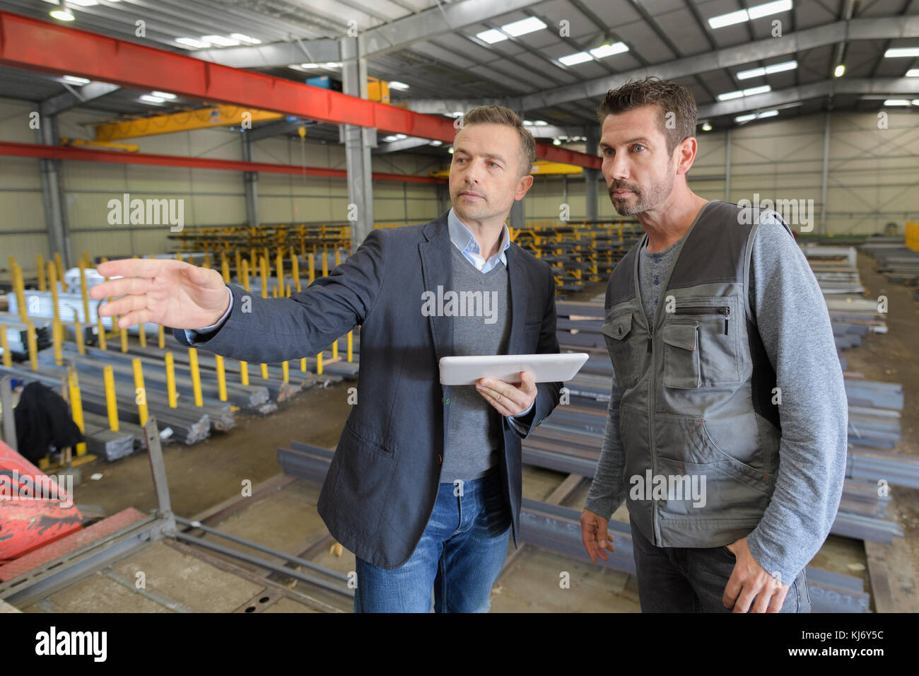 Giving instructions to the worker hi-res stock photography and images ...