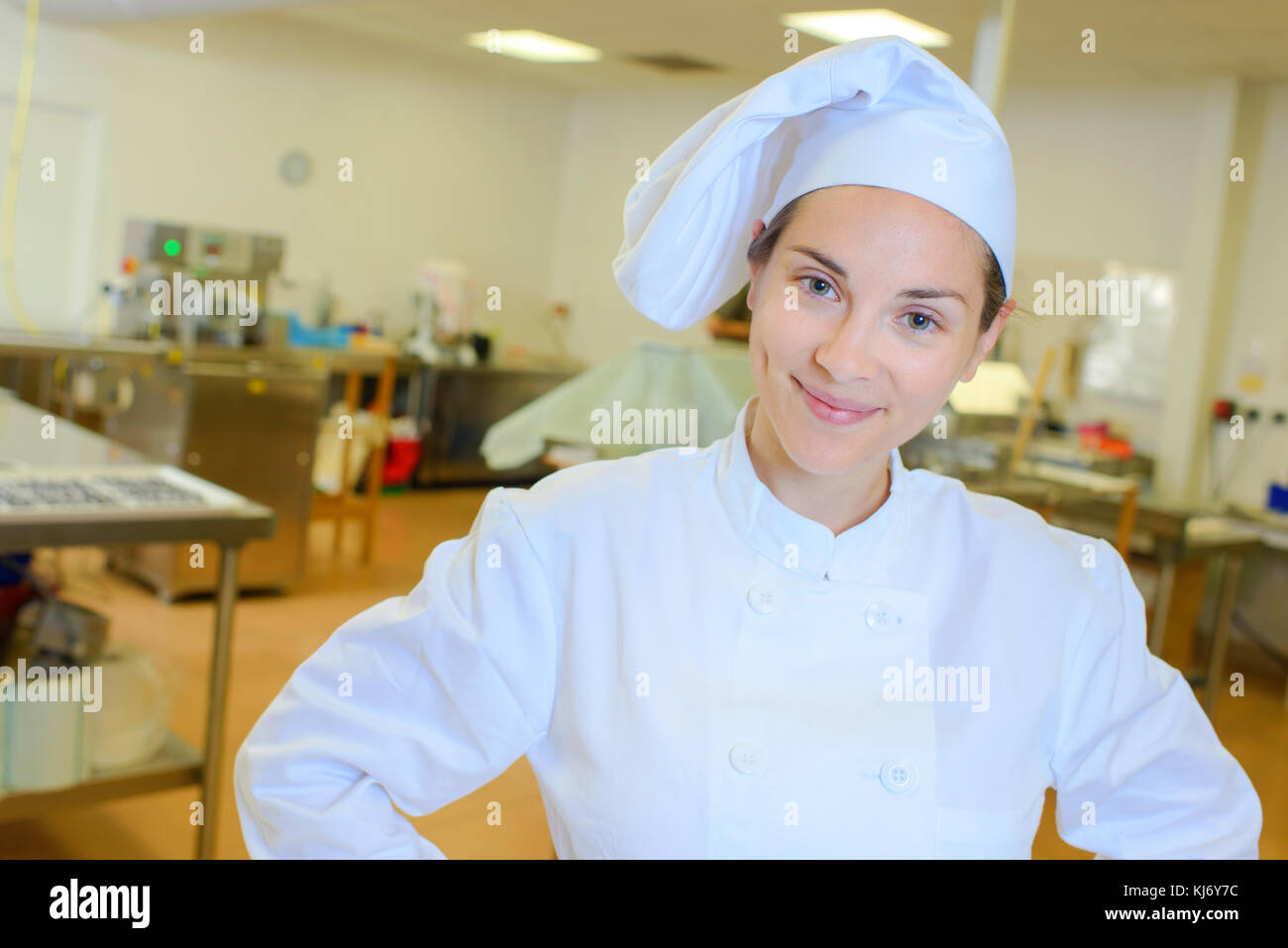 Portrait of smiling female chef Stock Photo - Alamy