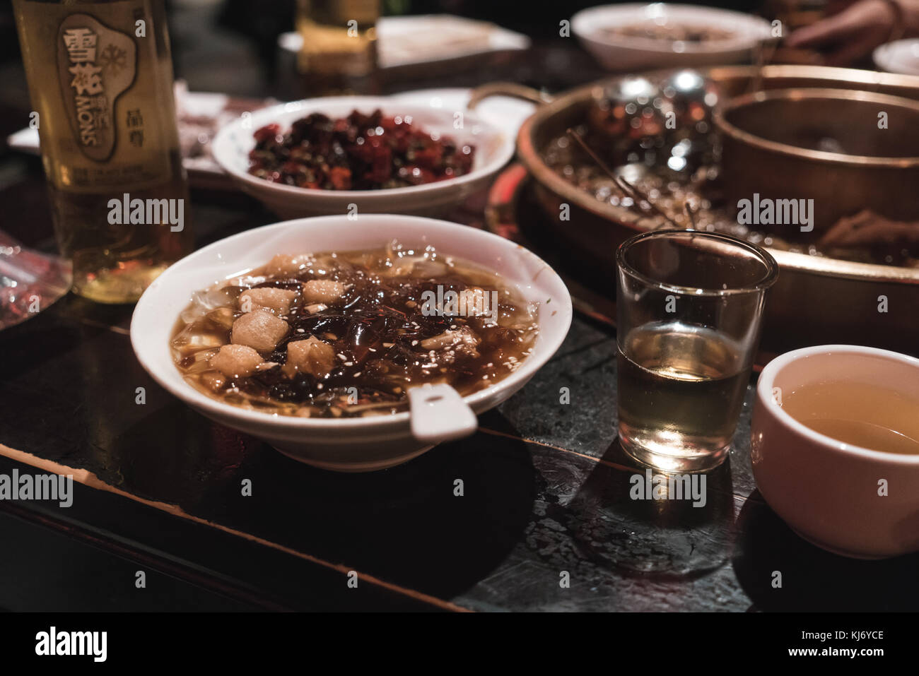 Table full of chinese dishes and hot pot soup in Chengdu, Sichuan ...