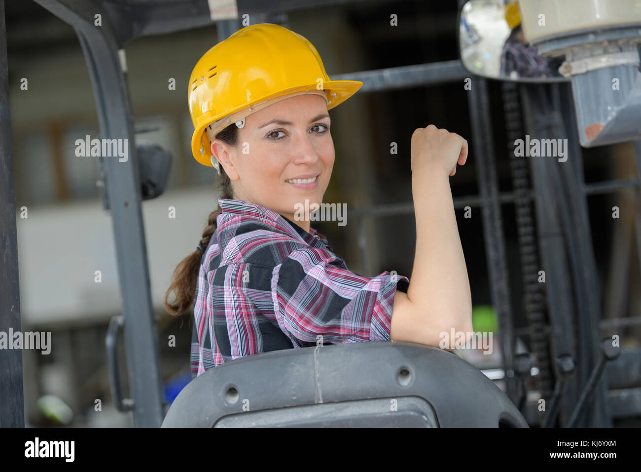 female worker operating forklift truck in shipping yard Stock Photo - Alamy
