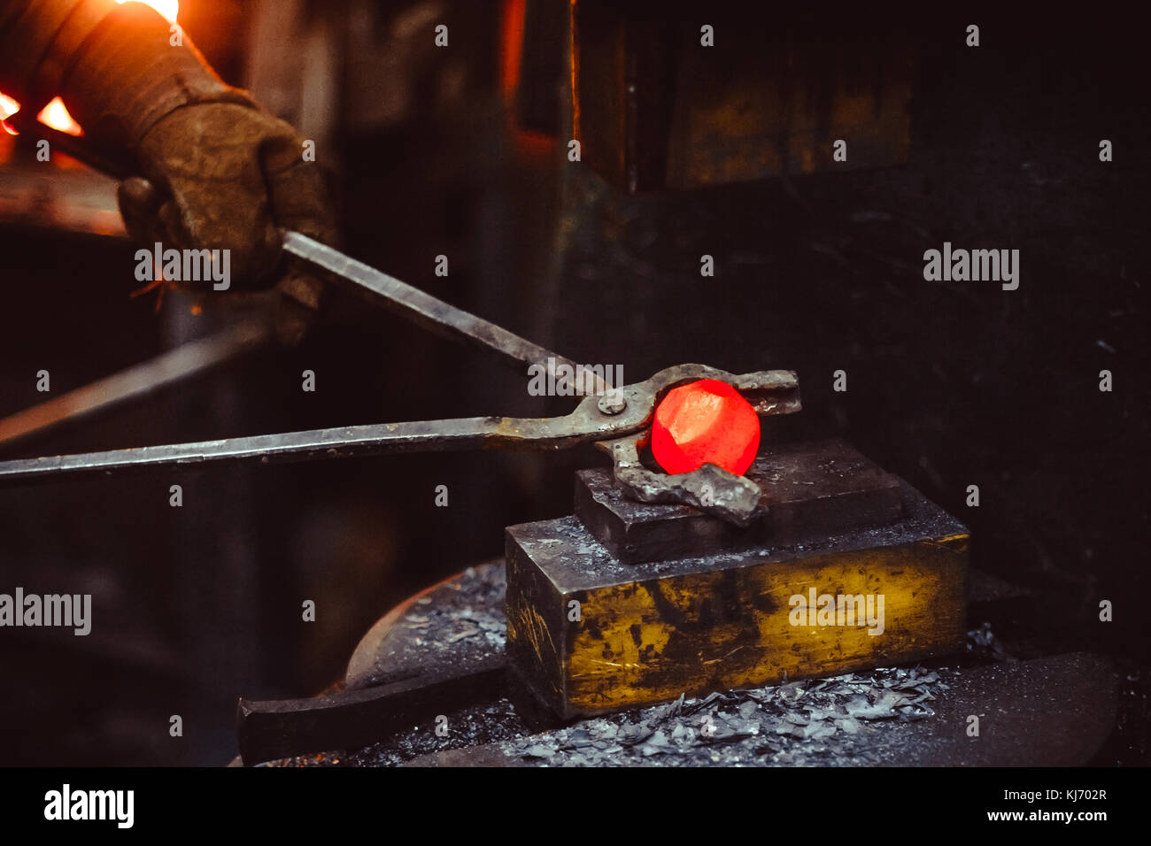 blacksmith working in the forge Stock Photo - Alamy
