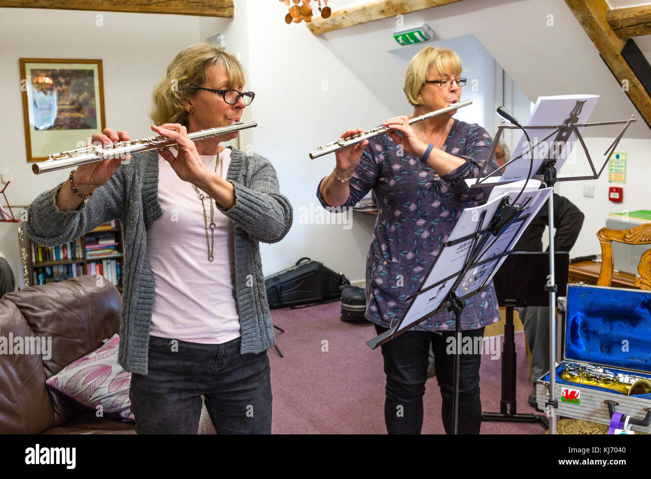 Woman playing flutes hi-res stock photography and images - Alamy