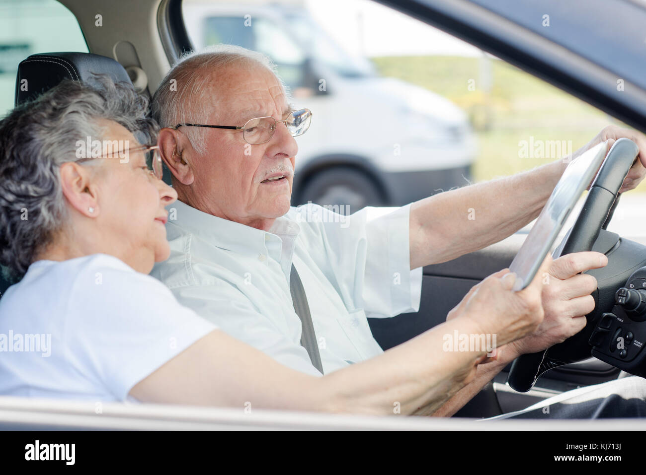driving with tablet Stock Photo - Alamy