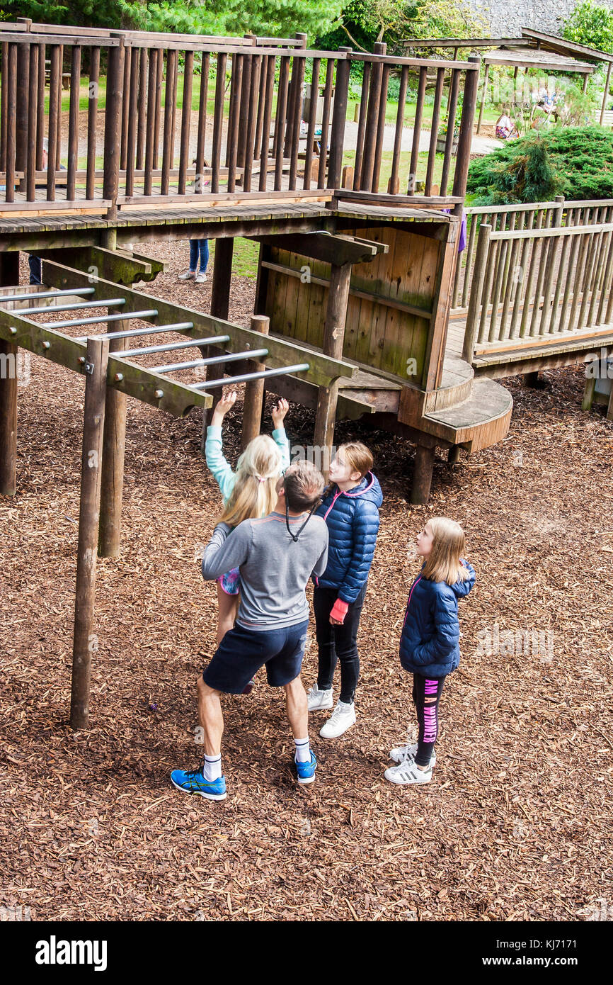 Children playing in a wooden playground Ireland Stock Photo - Alamy