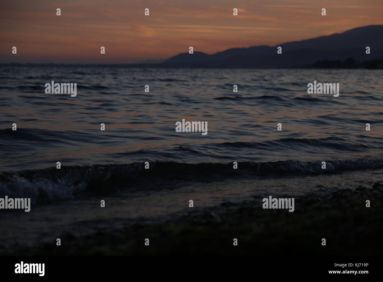 Silhouette of rocks by sunset in turke Akcay Edremit Stock Photo - Alamy