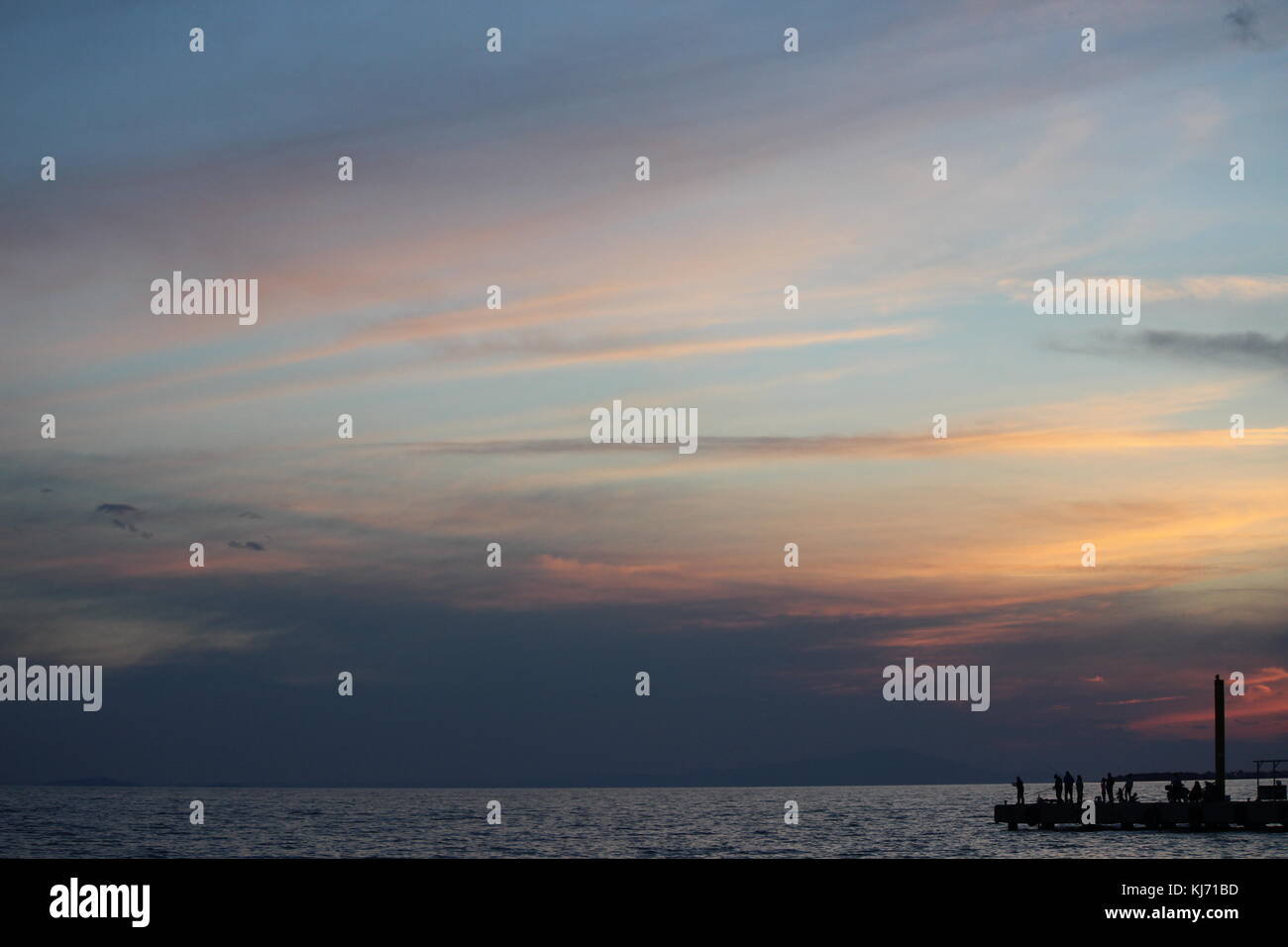 Landing stage by sunset Stock Photo - Alamy