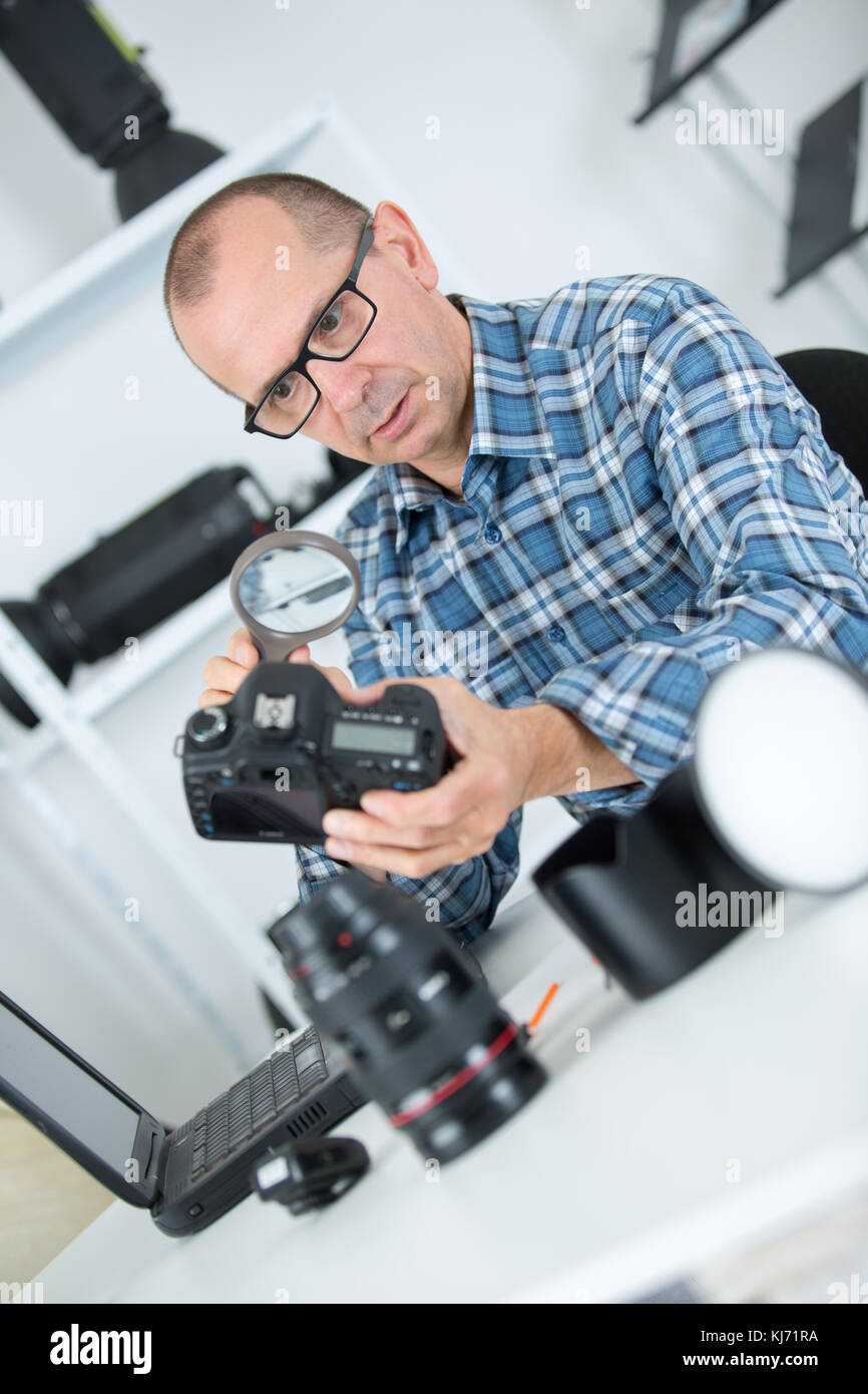 man with magnifier Stock Photo - Alamy