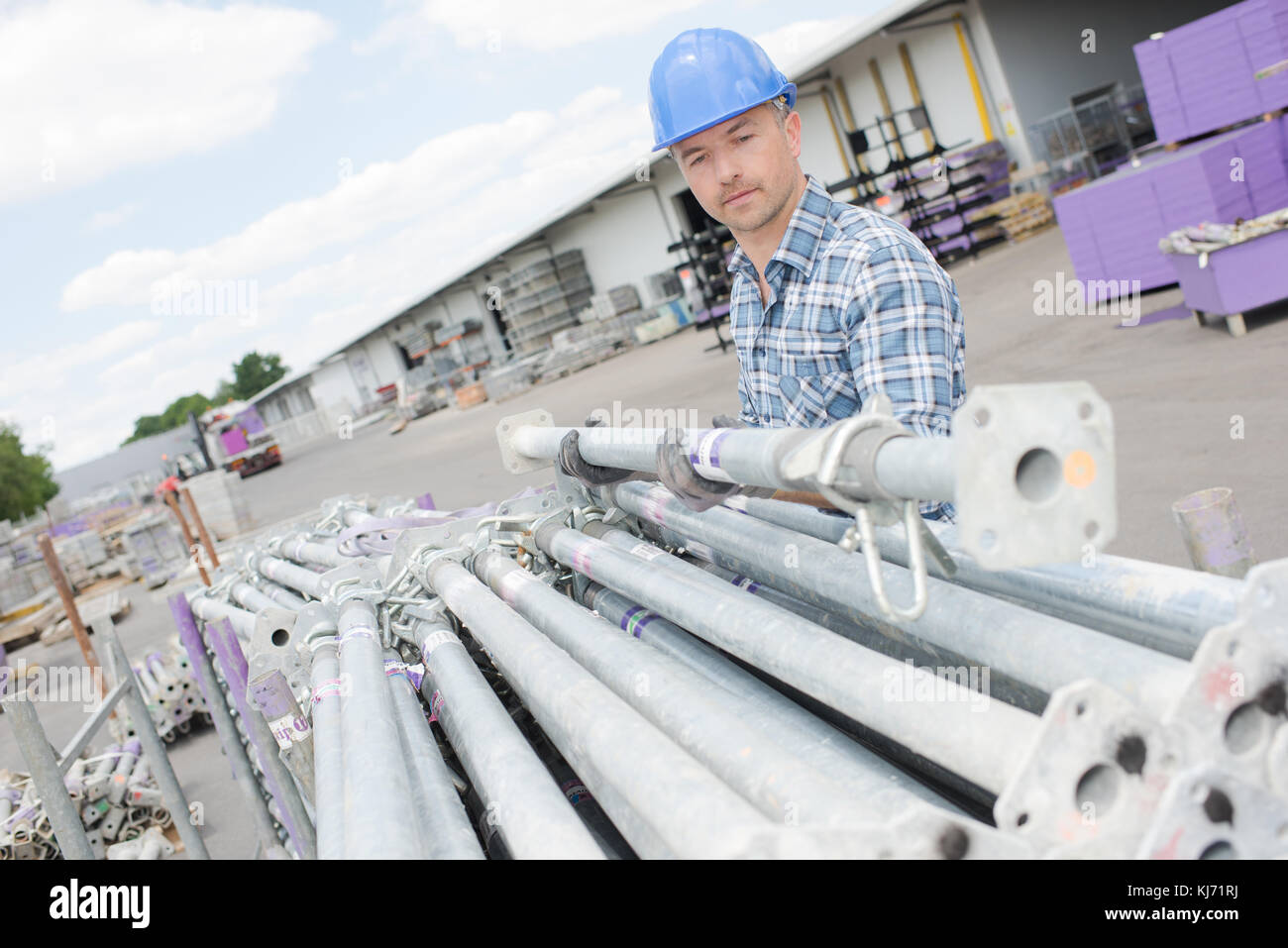 man filing the tubes Stock Photo - Alamy