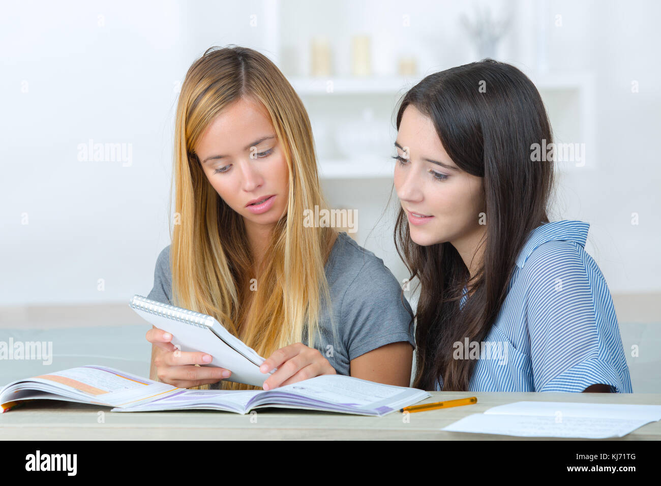 student studying in the living room at home Stock Photo - Alamy