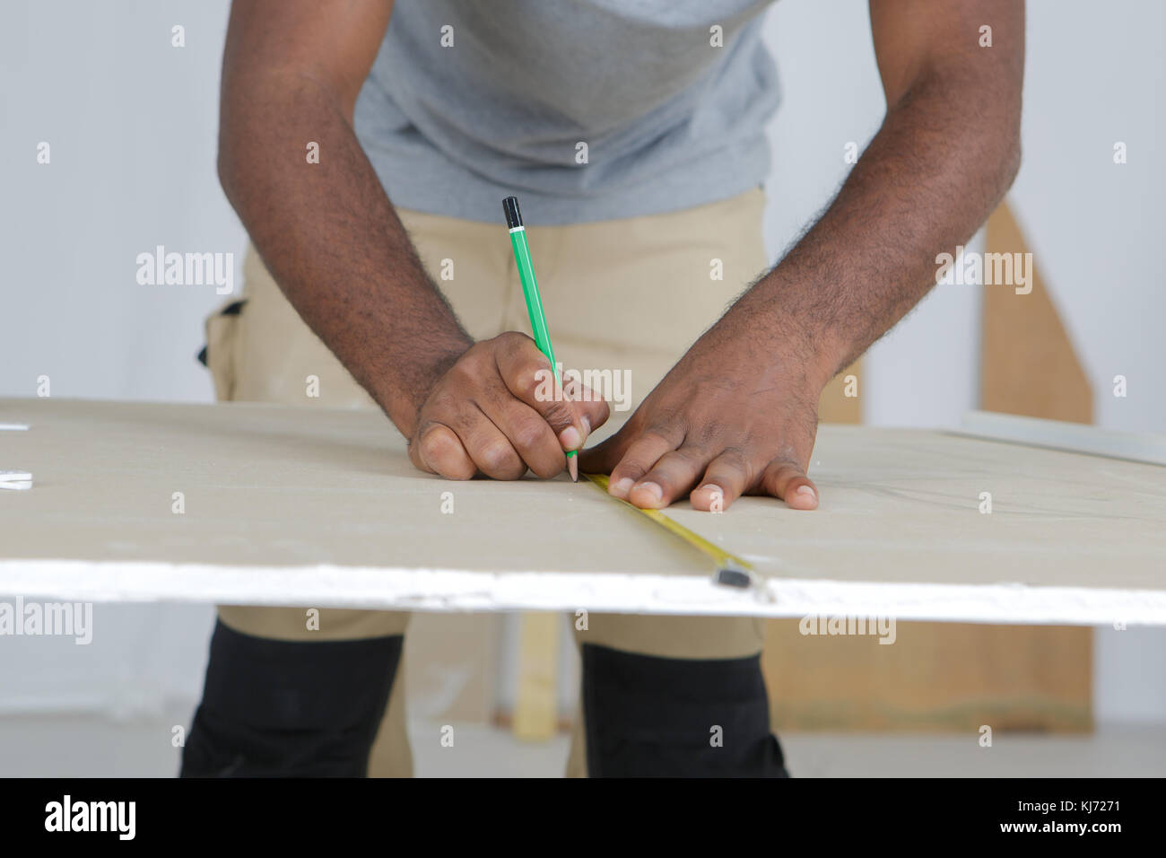using pencil and ruler Stock Photo - Alamy