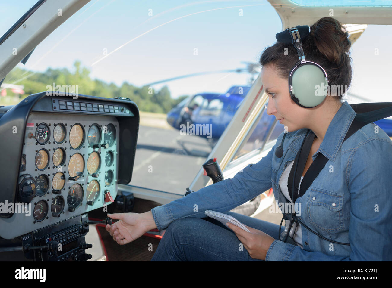 young woman helicopter pilot Stock Photo - Alamy