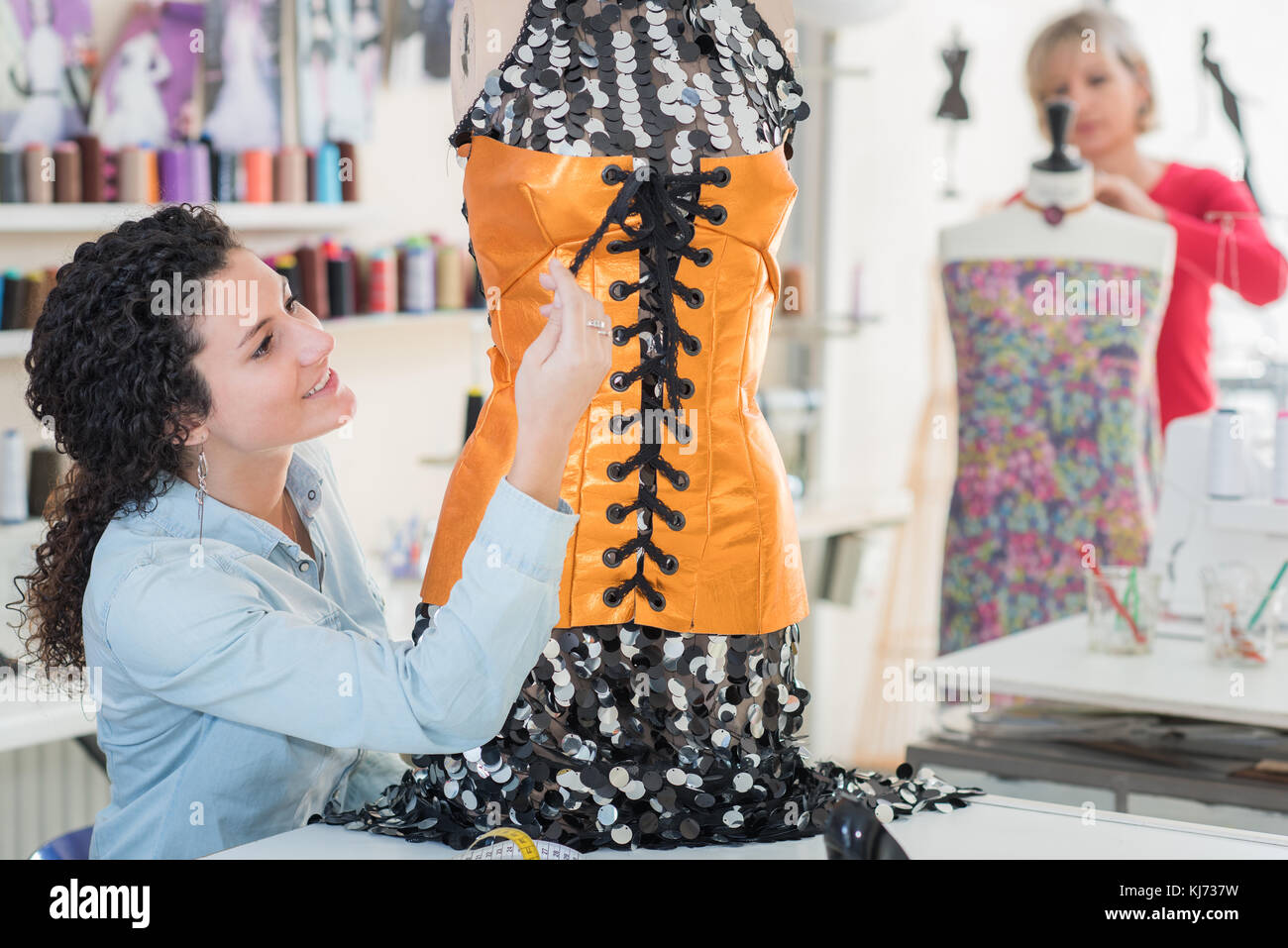 Women in dressmaking studio Stock Photo - Alamy