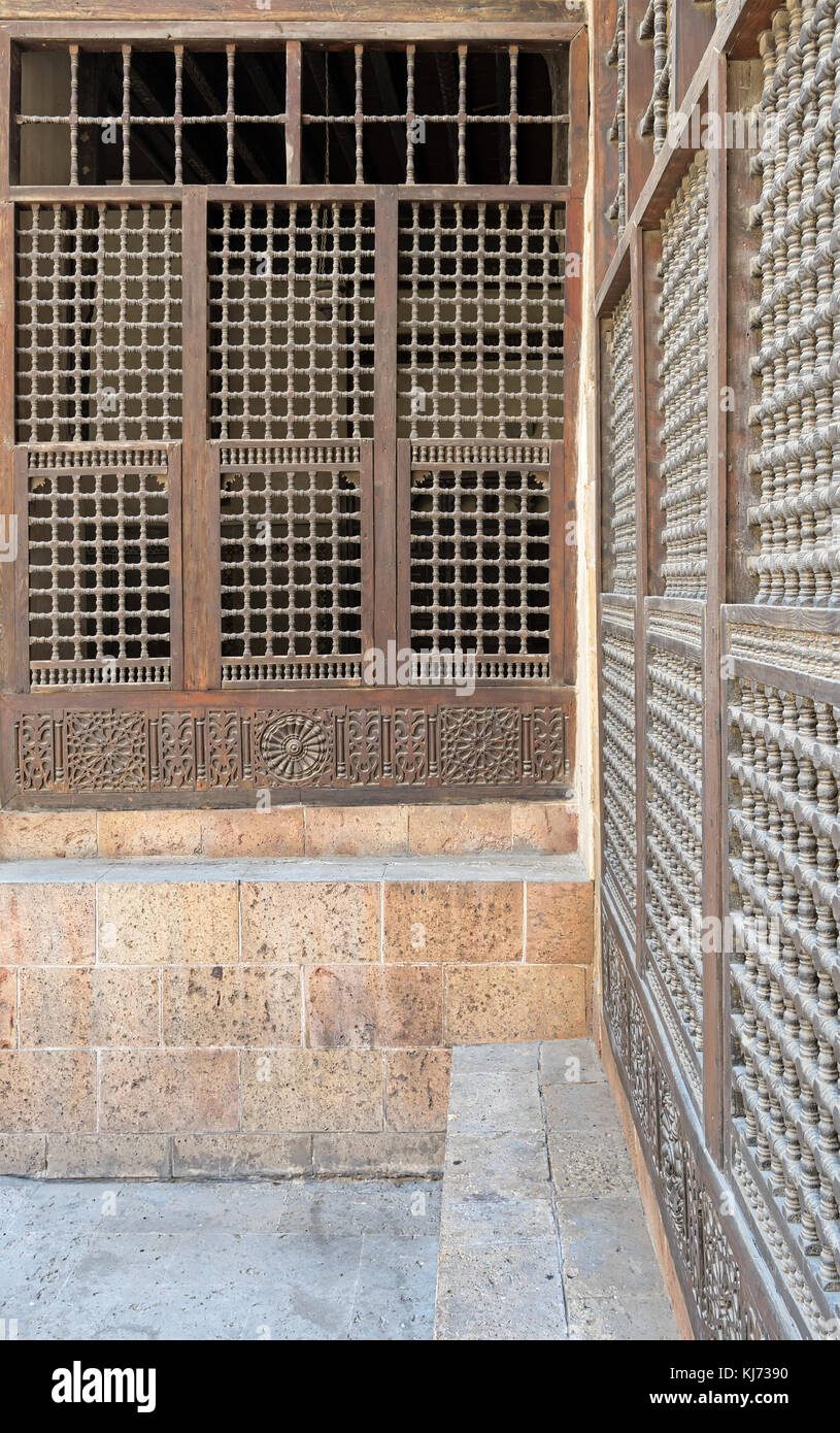 Wooden ornate windows over stone brick wall, Old Cairo, Egypt Stock ...