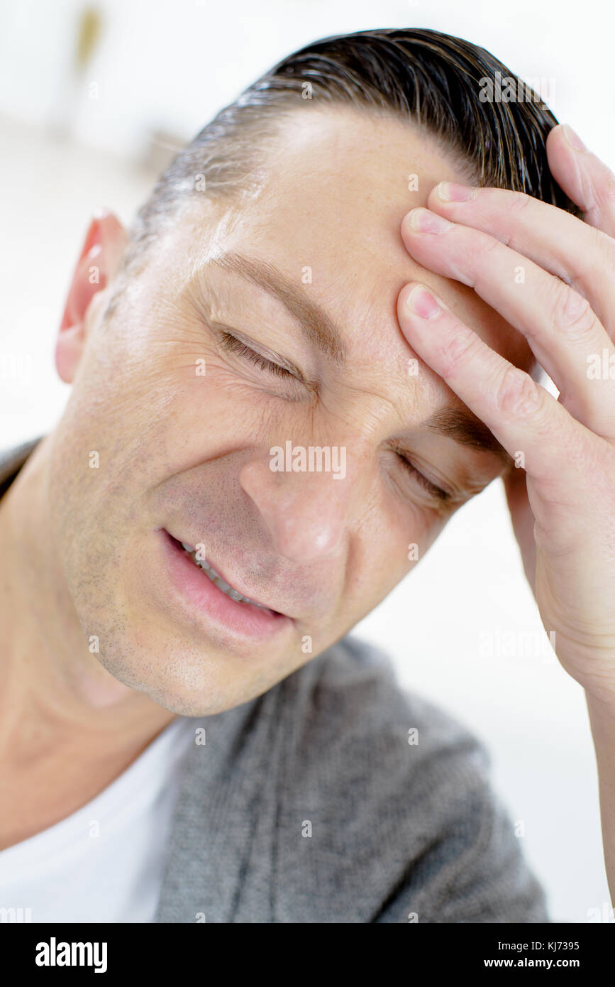 man having head ache Stock Photo - Alamy