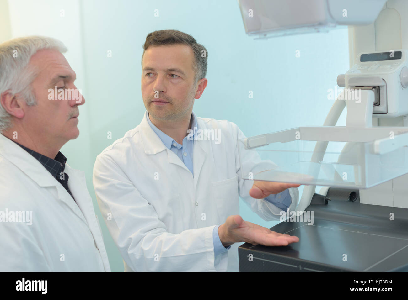 health technologist proposing a new type of machine Stock Photo - Alamy