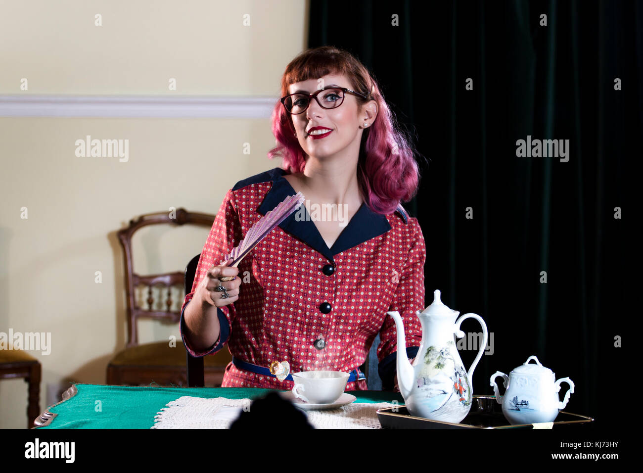 Vintage themed tea girl on a old retro house Stock Photo - Alamy