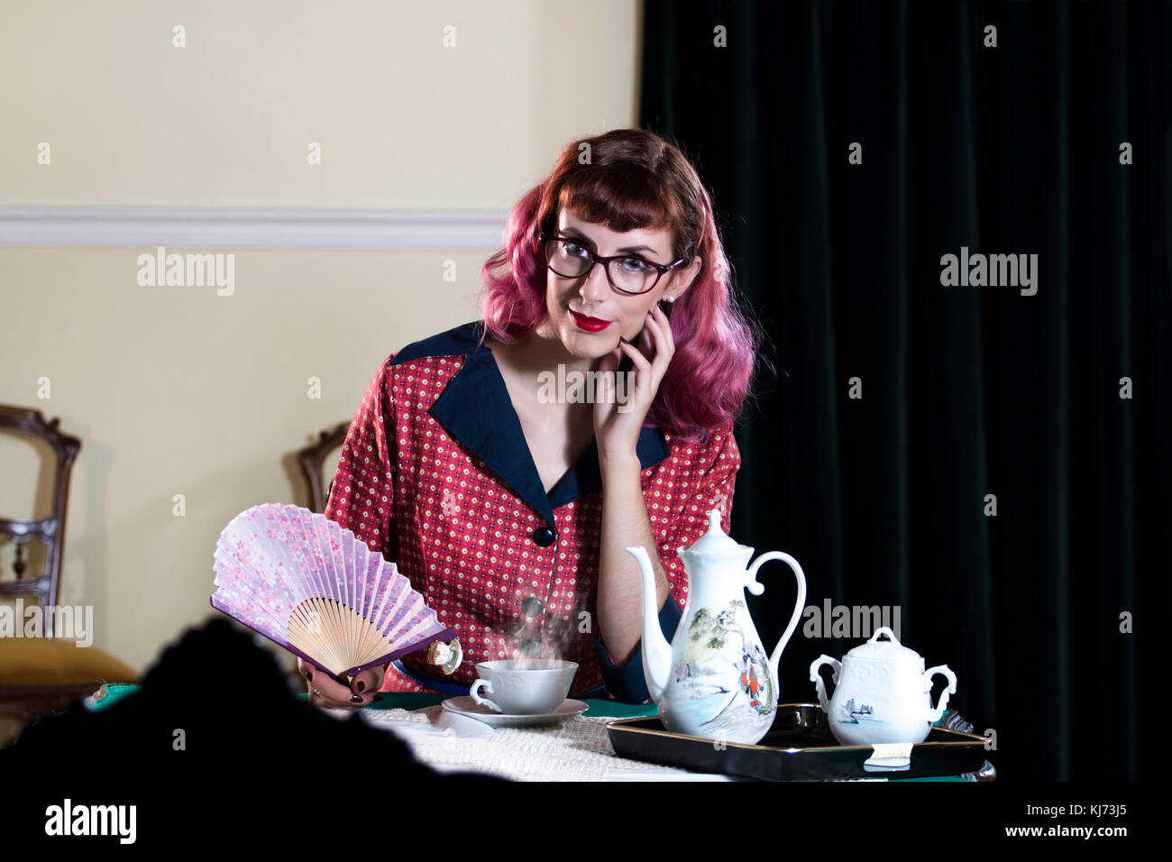 Vintage themed tea girl on a old retro house Stock Photo - Alamy