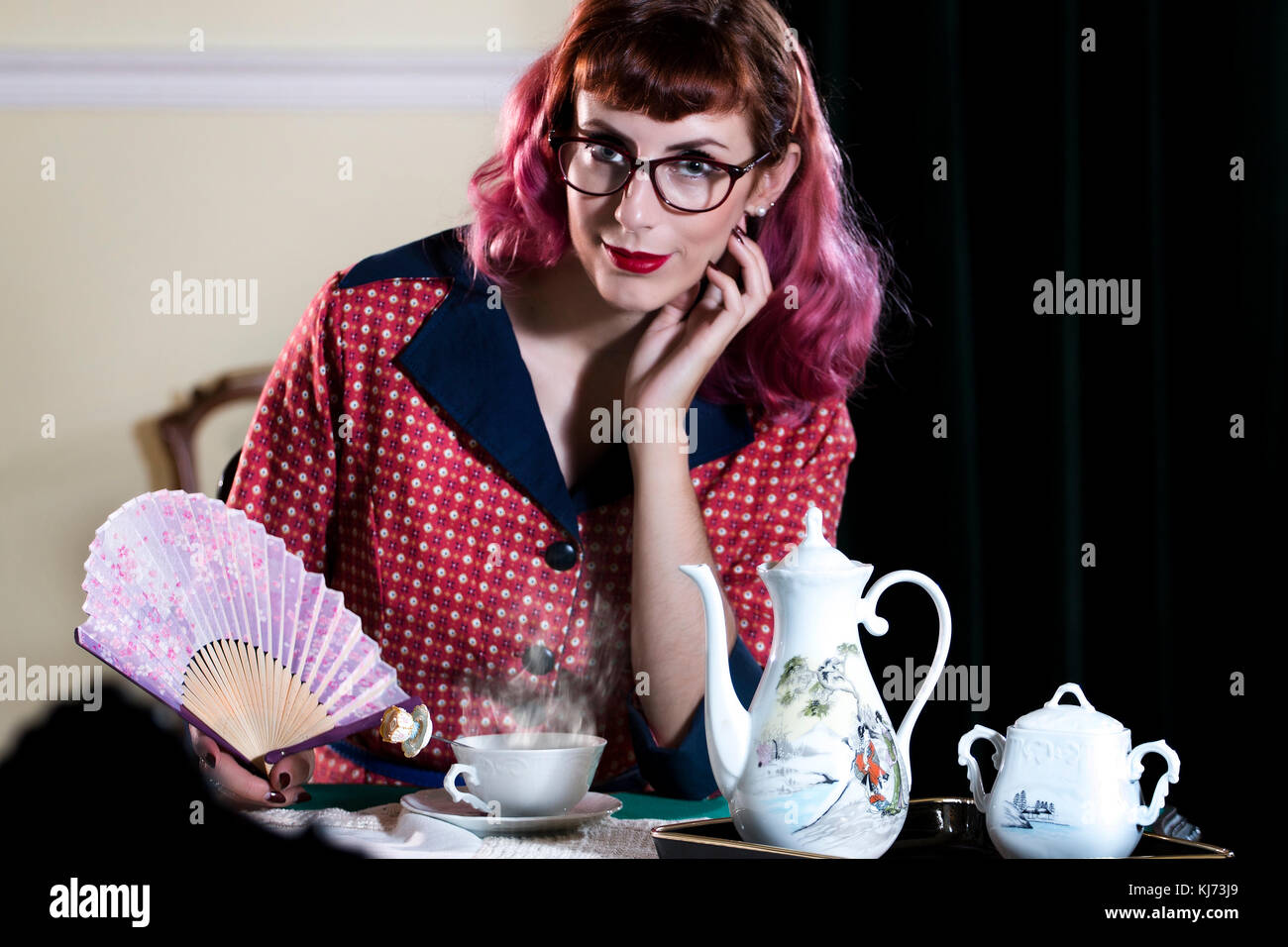 Vintage themed tea girl on a old retro house Stock Photo - Alamy