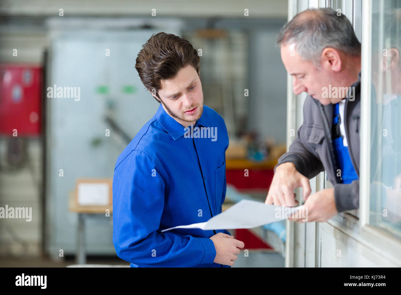 supervisor giving instructions Stock Photo - Alamy