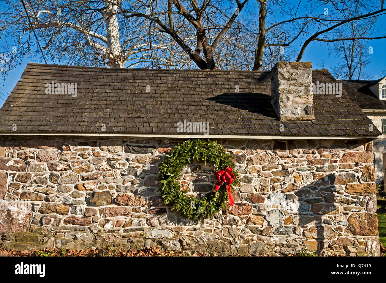 Historic stone spring house with a Christmas wreath, Lancaster County ...