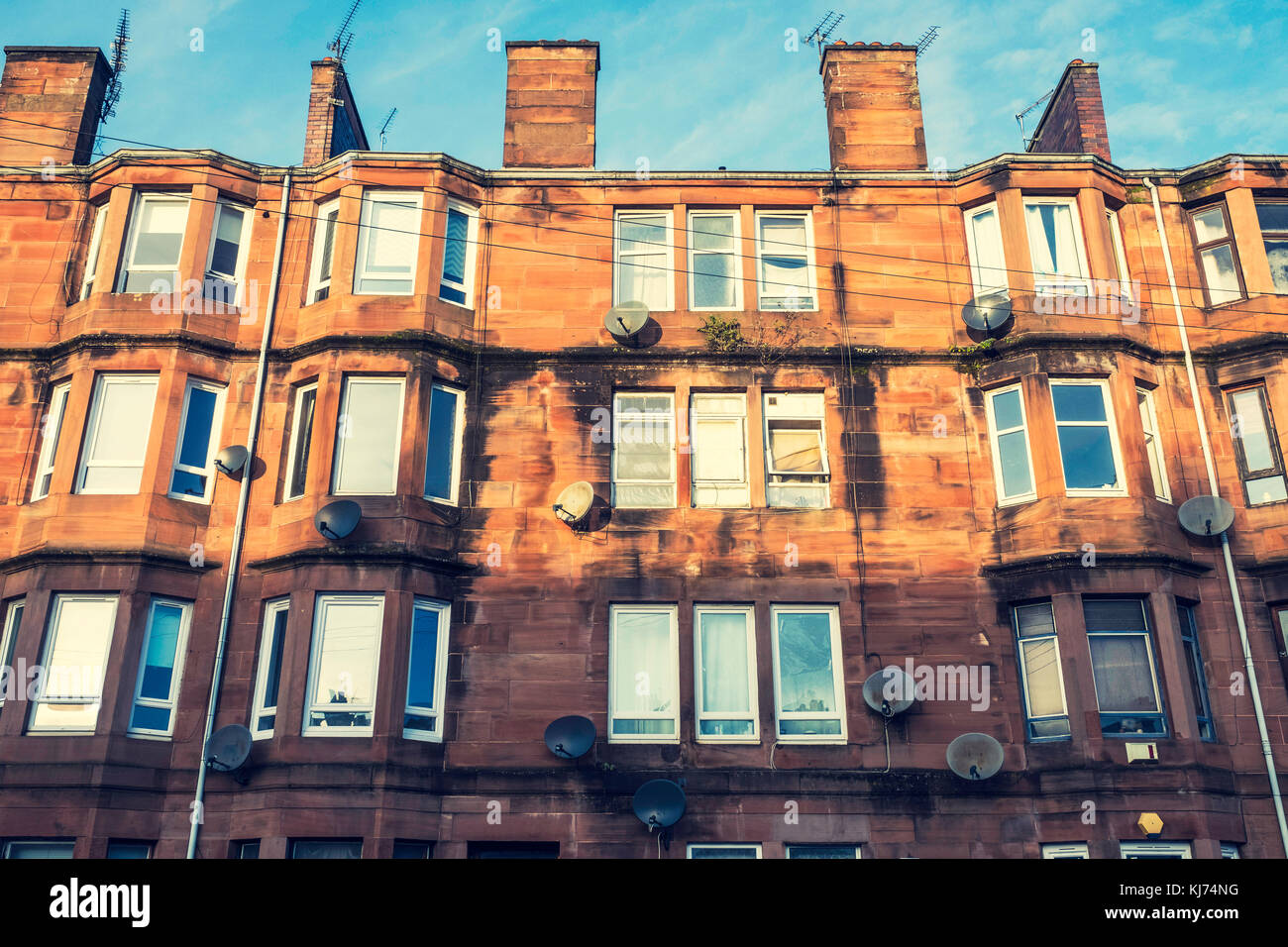 View of typical red sandstone tenement apartment building in Govanhill ...