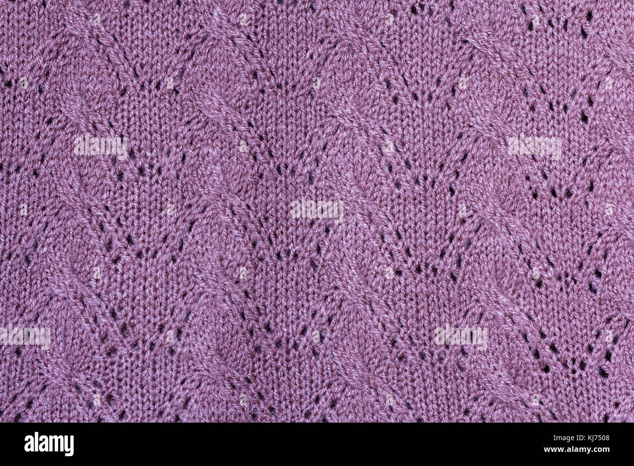Background texture of violet pattern knitted fabric made of cotton or ...