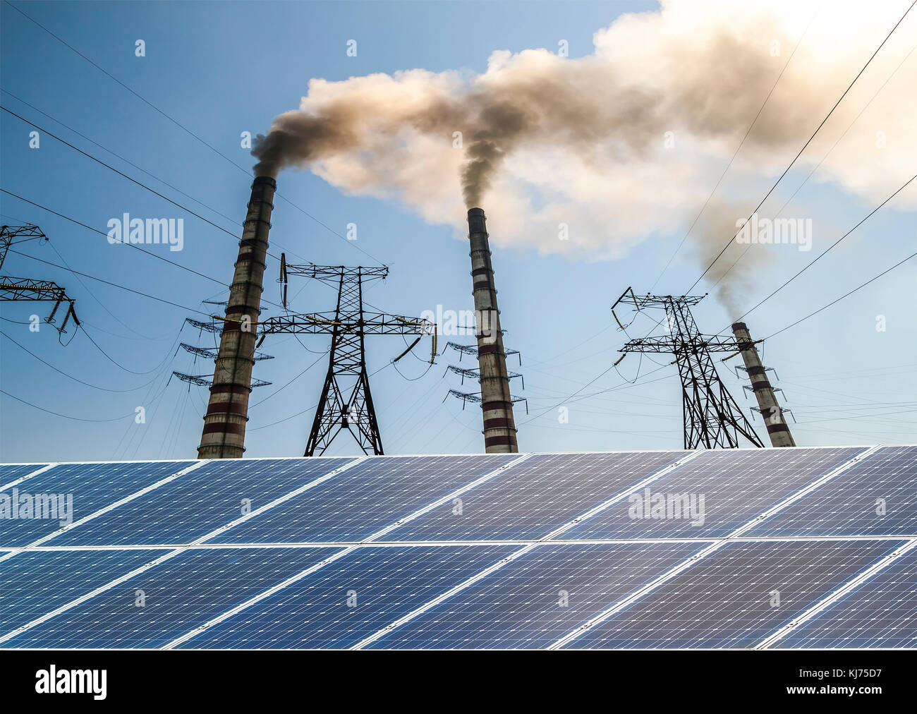 Solar panels against fuel coal power plant. Sustainable development and ...