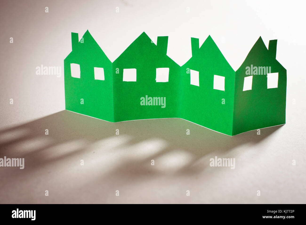 Figures of many houses. Miniatures of paper Stock Photo - Alamy