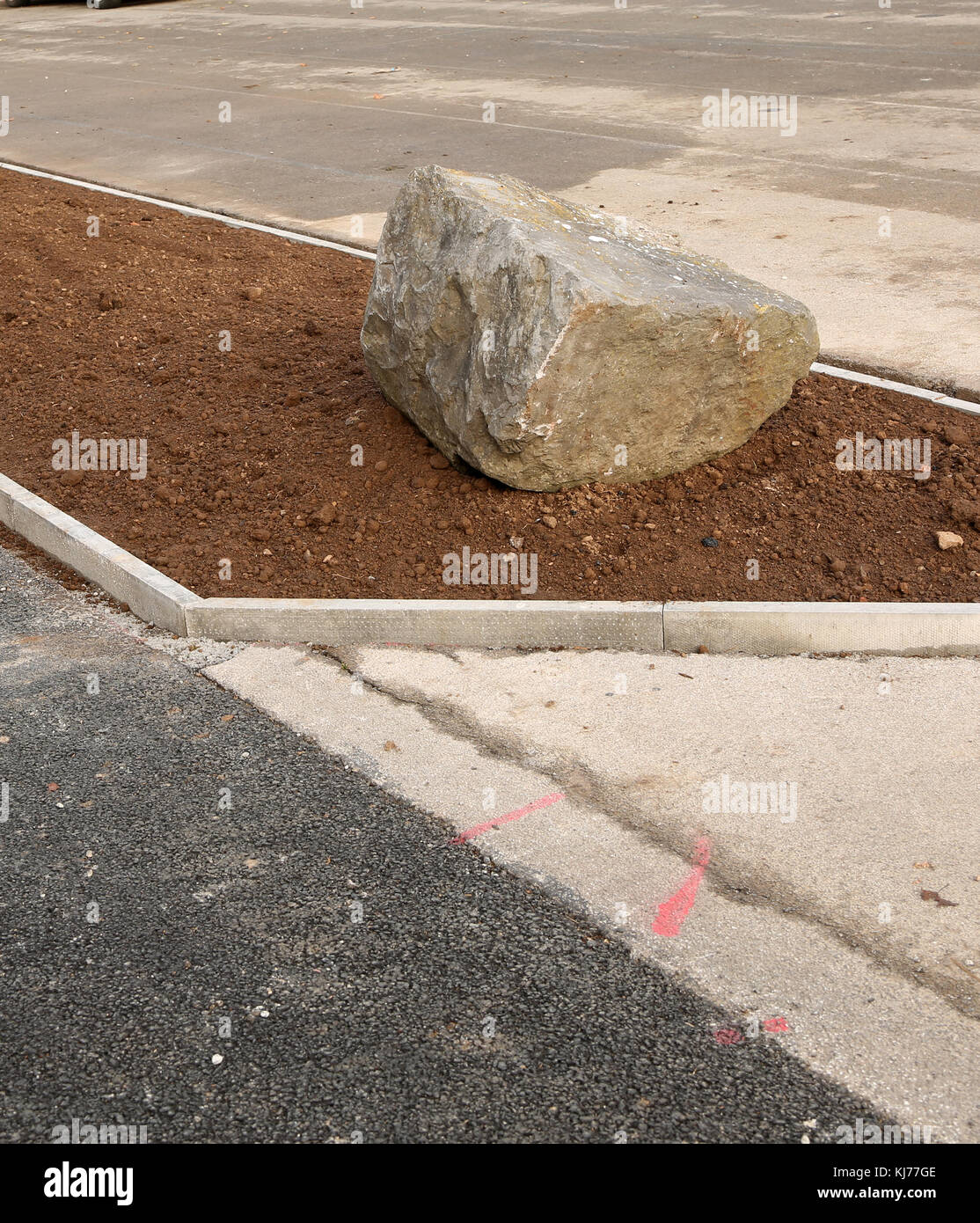 October 2015 - New kerb edging in a superstore car park lot Stock Photo ...
