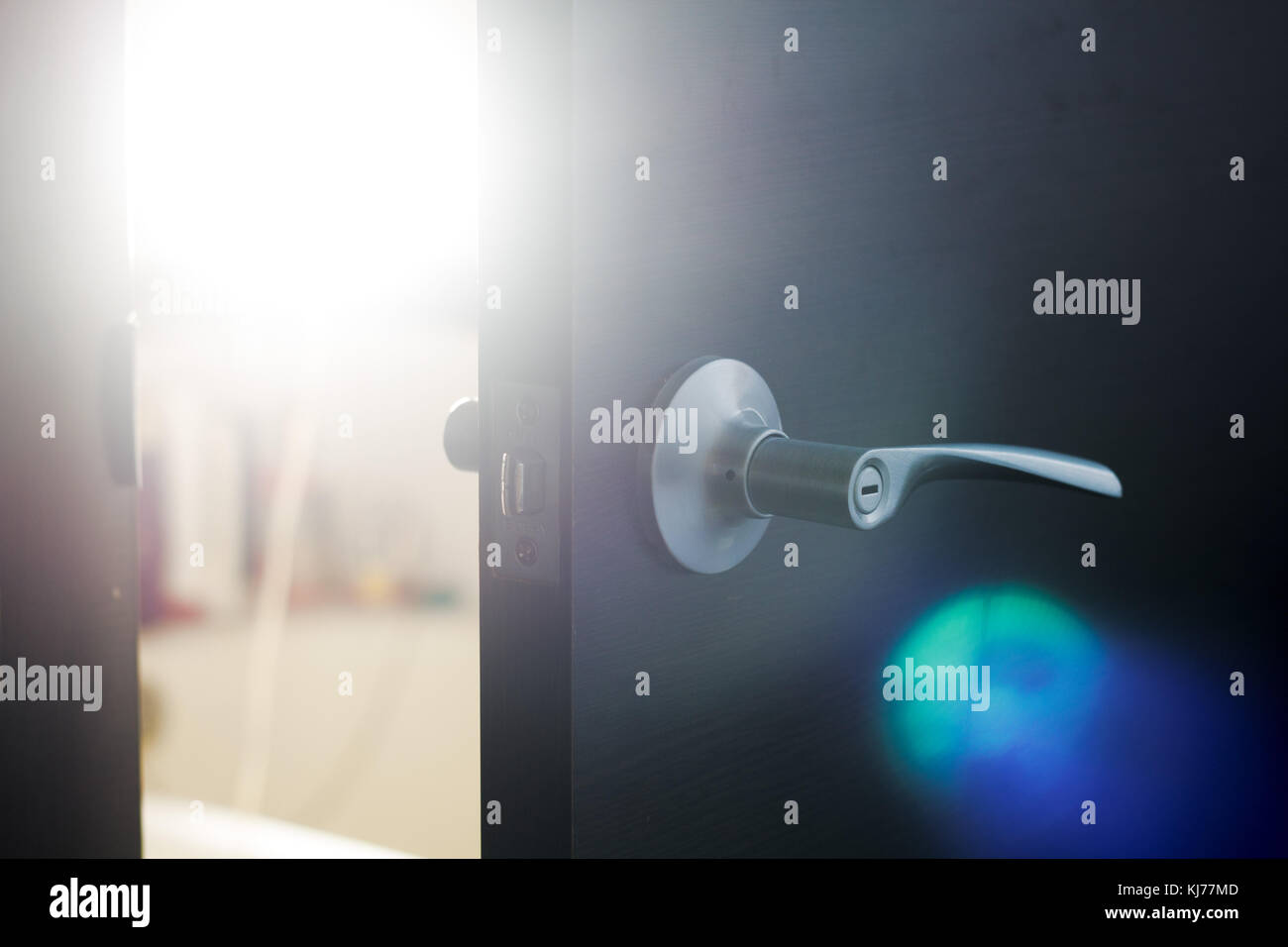 beam of light behind an open door Stock Photo - Alamy