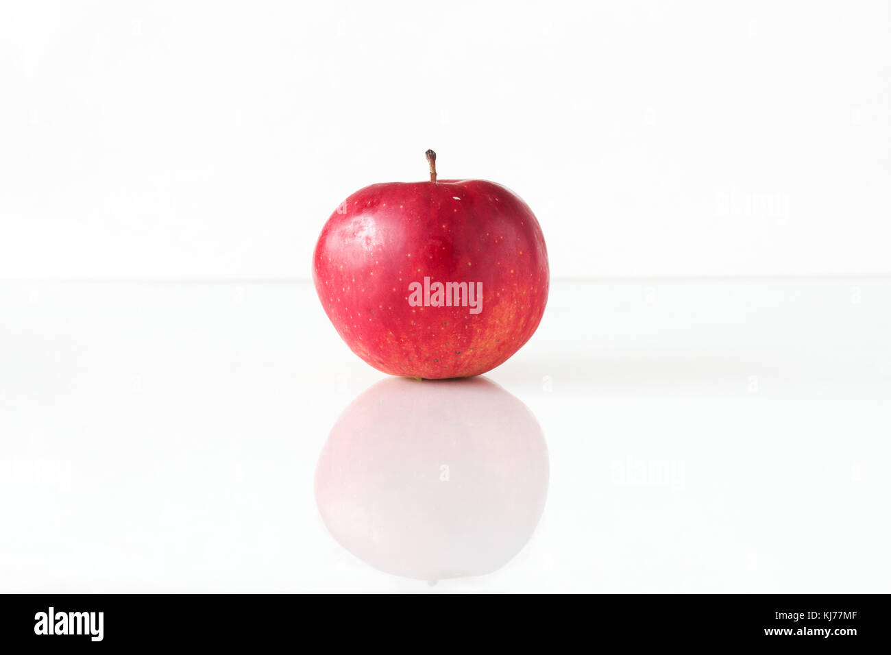 apple mirroring on white background Stock Photo - Alamy