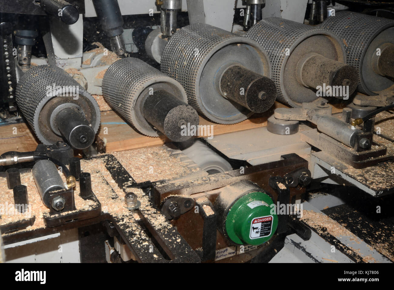 detail of the cutters inside a four sider machine, used to plane rough ...