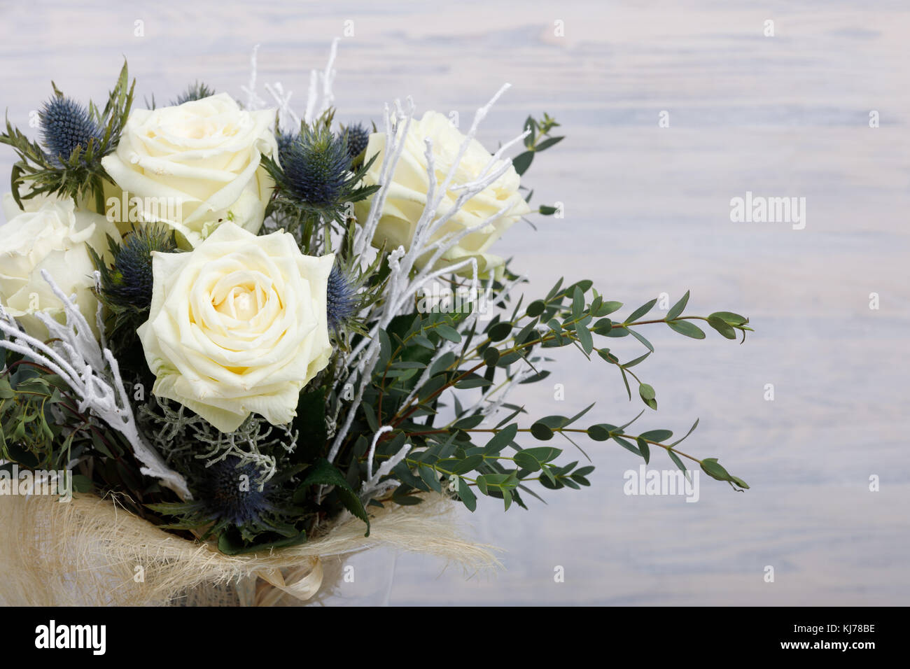 Bouquet of fresh white yellow roses on retro vintage white background ...