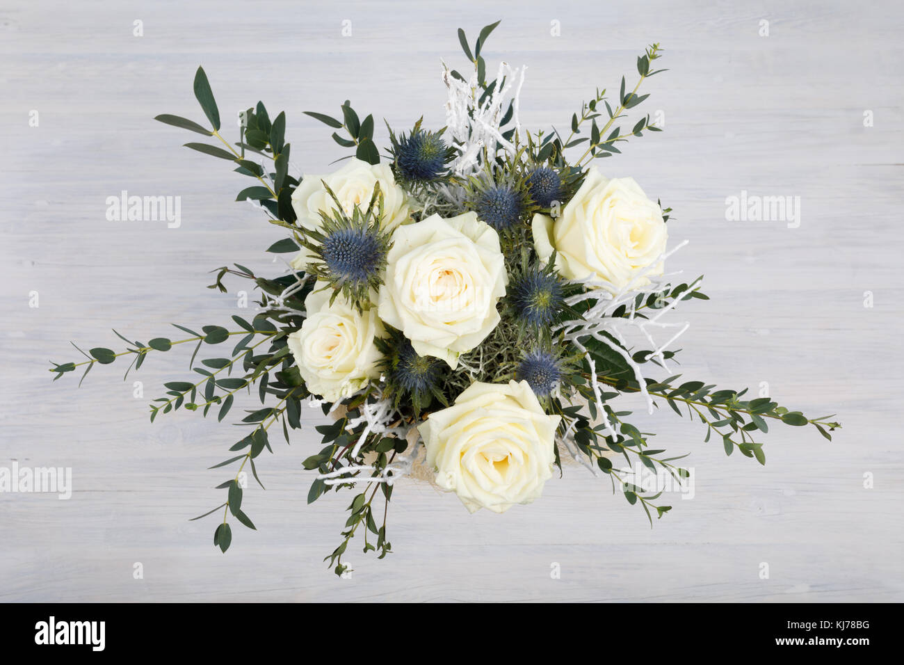 Bouquet of fresh white yellow roses on retro vintage white background ...