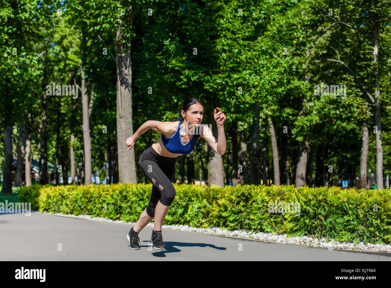 sportive teen running in the park Stock Photo - Alamy