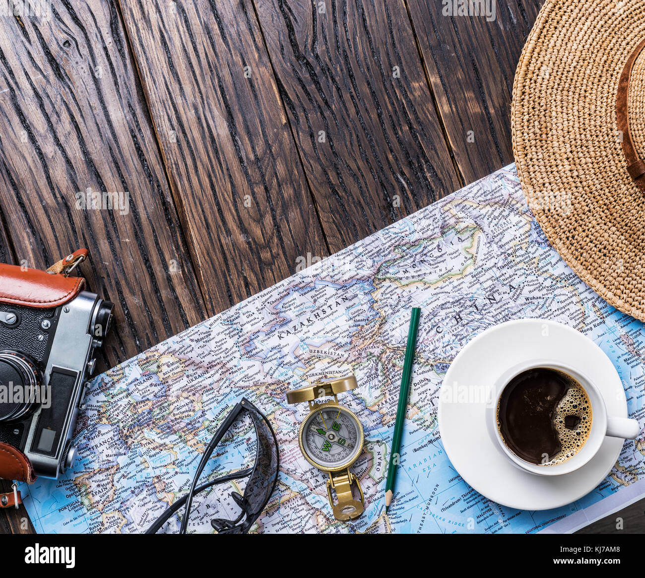 Planning new travel destinations on the world map. Top view Stock Photo ...