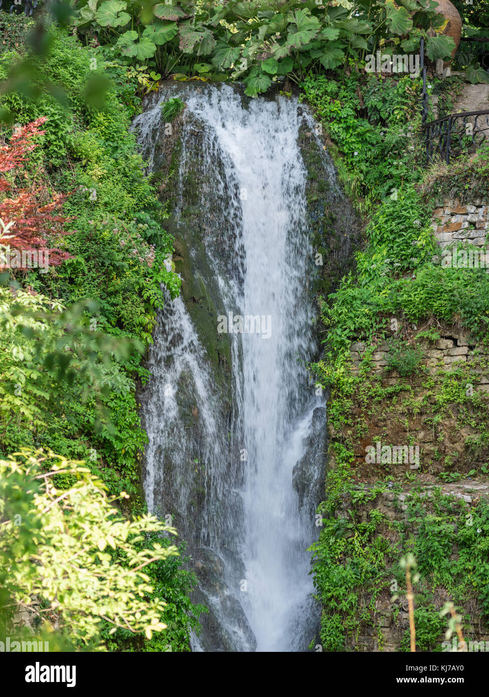Waterfall in the hill. Nature background Stock Photo - Alamy