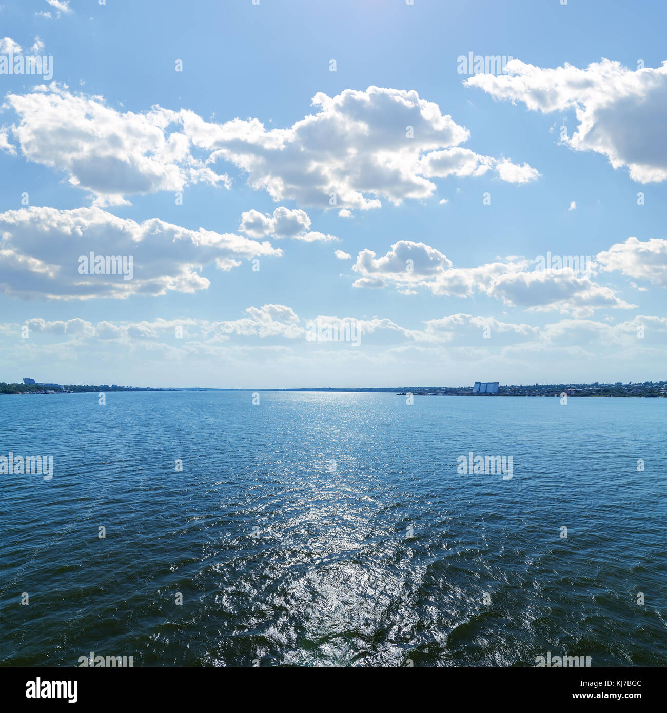 clouds in blue sky over river Stock Photo - Alamy