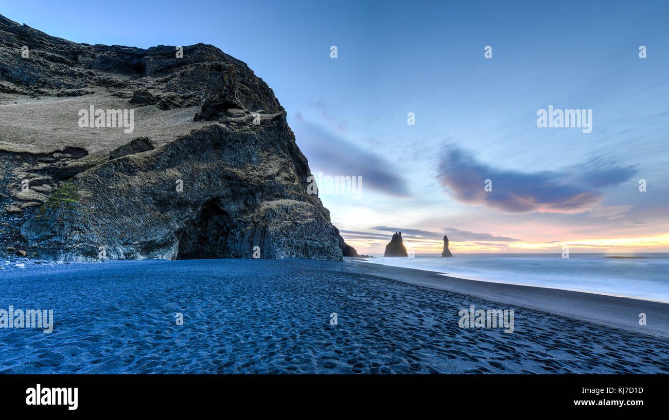 Wide view of Reynisdrangar rock formations on Reynisfjara Beach at ...