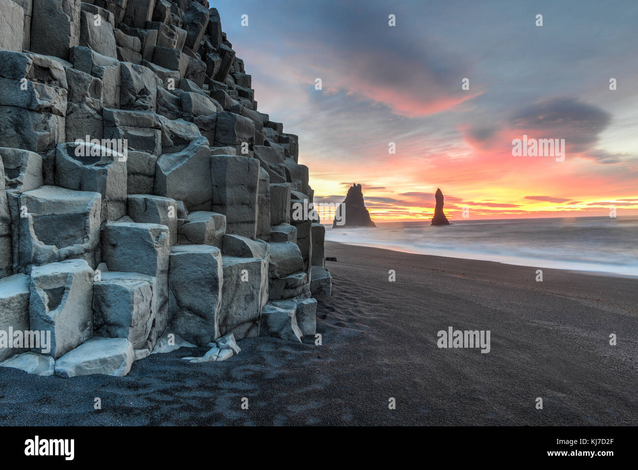 Wide view of Reynisdrangar rock formations on Reynisfjara Beach at ...