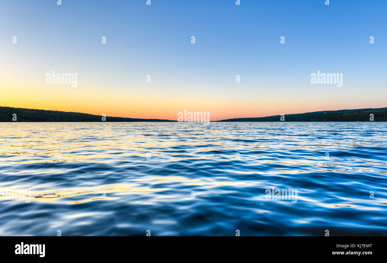 Seneca Lake, one of the Finger Lakes in Upstate New York at sunset ...